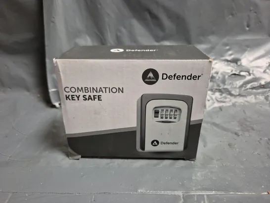 Lot 2764: BOXED DEFENDER COMBINATION KEY SAFE - 5235818 | Simon Charles ...