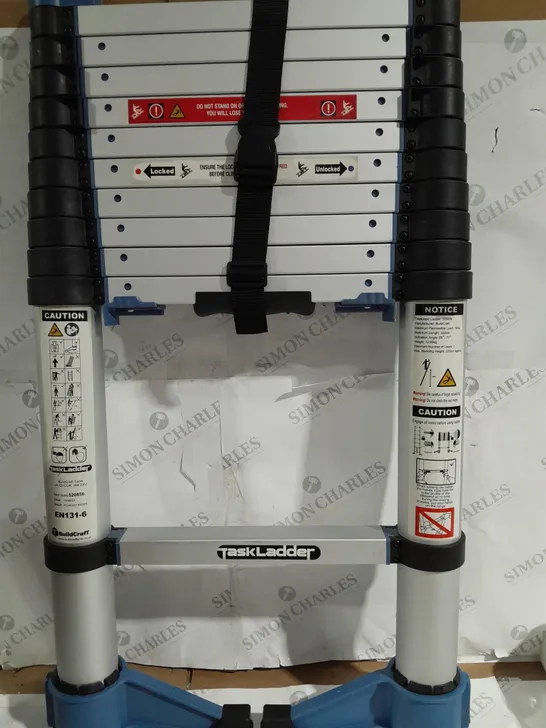 Lot 1007: BUILDCRAFT 3.2M TELESCOPIC LADDER WITH FOLDABLE STABILISER ...