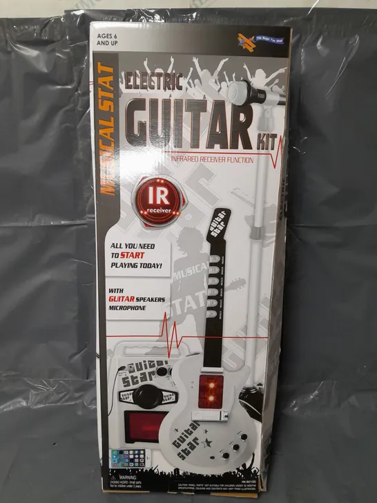 Lot 1611: BOXED MUSICAL STAT ELECTRIC GUITAR KIT TOY - 5010903 | Simon ...
