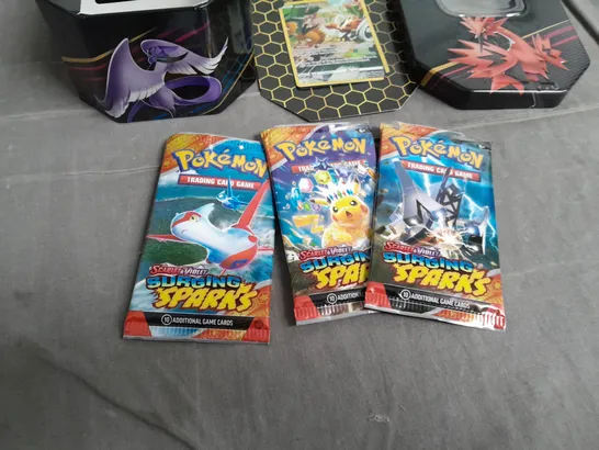 Lot 7463: POKEMON TRADING CARD GAME TIN WITH ZAPDOS CARD AND THREE ...