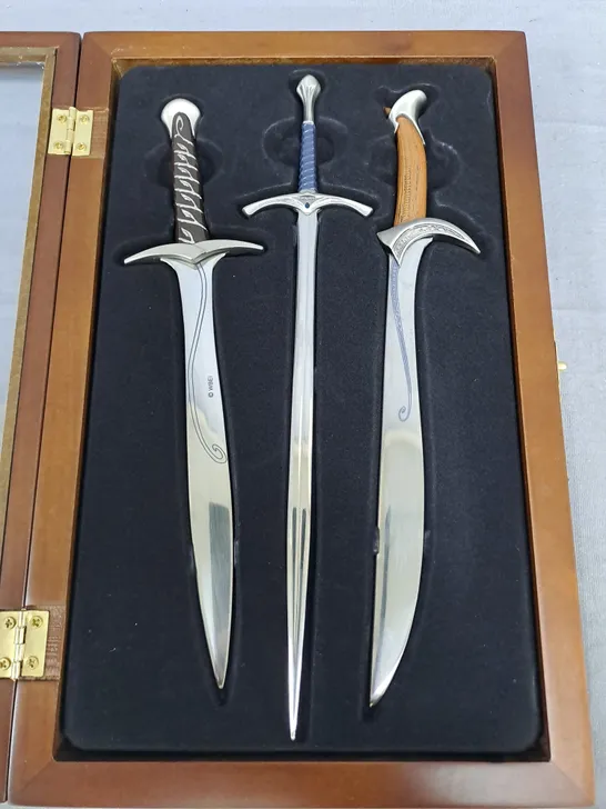 Lot 3130: THE HOBBIT SWORDS DISPLAY: STING, GLAMDRING & ORCRIST IN ...