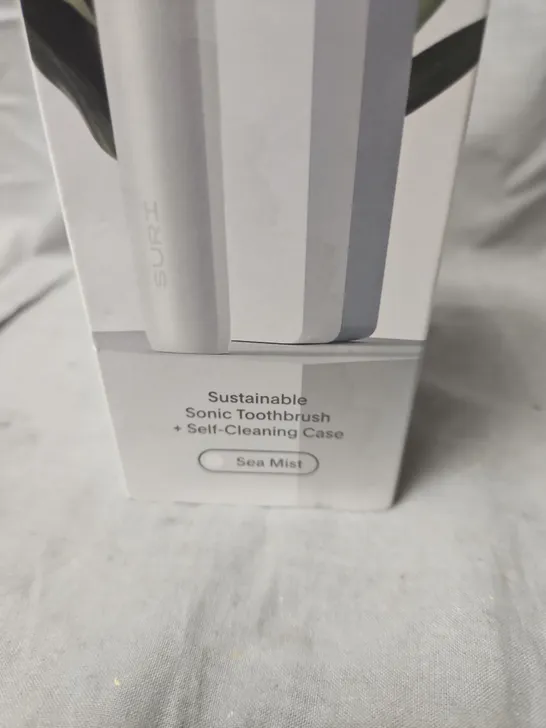 Lot 1081: BOXED AND SEALED SURI SUSTAINABLE SONIC TOOTHBRUSH + SELF ...