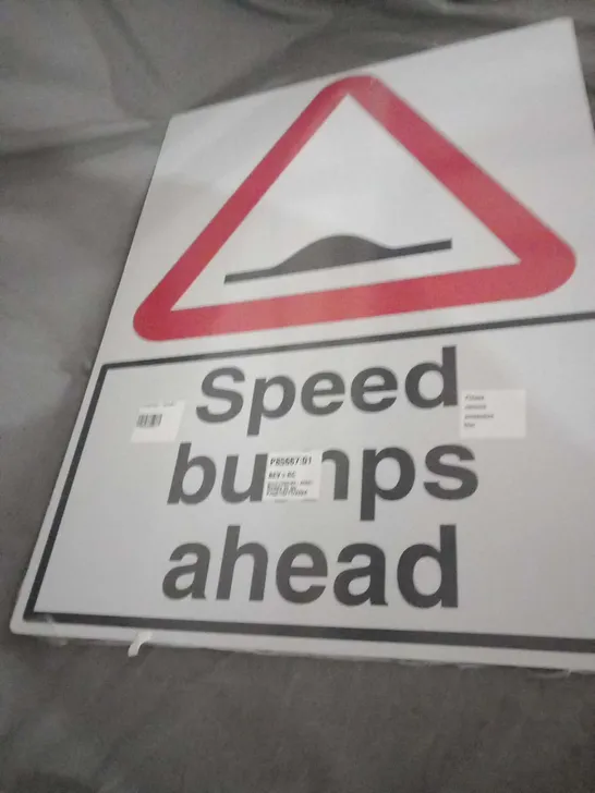 Lot 6171: SPEED BUMPS AHEAD ROAD SIGN - 5020831 | Simon Charles Auctioneers