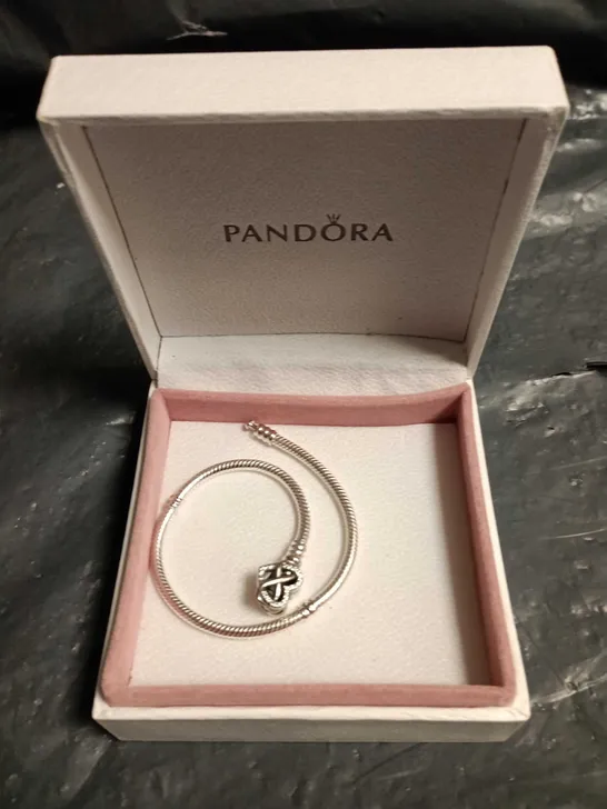 Lot 2059: PANDORA BRACELET WITH KNOT CHARM PRESENTED IN PANDORA BOX ...