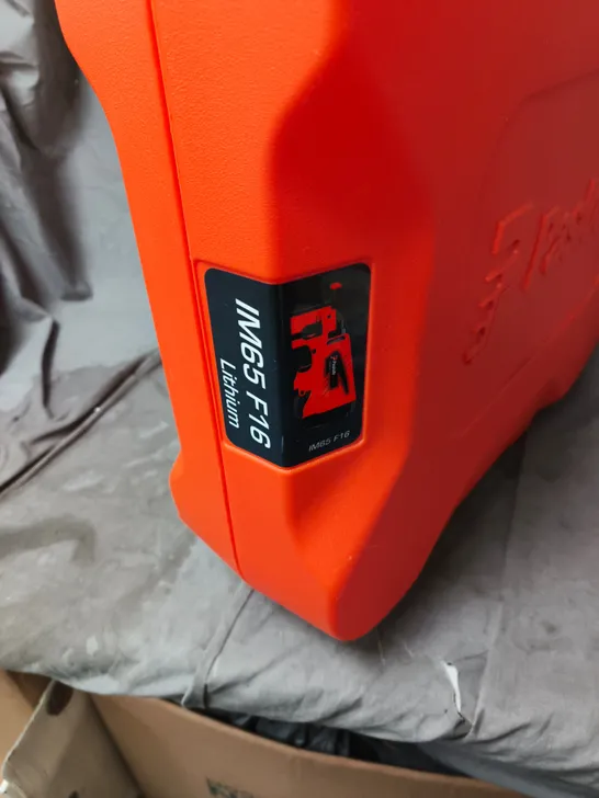Lot 9815: PASLODE IM65 F76 LITHIUM CORDLESS NAIL GUN – ORANGE CARRY ...