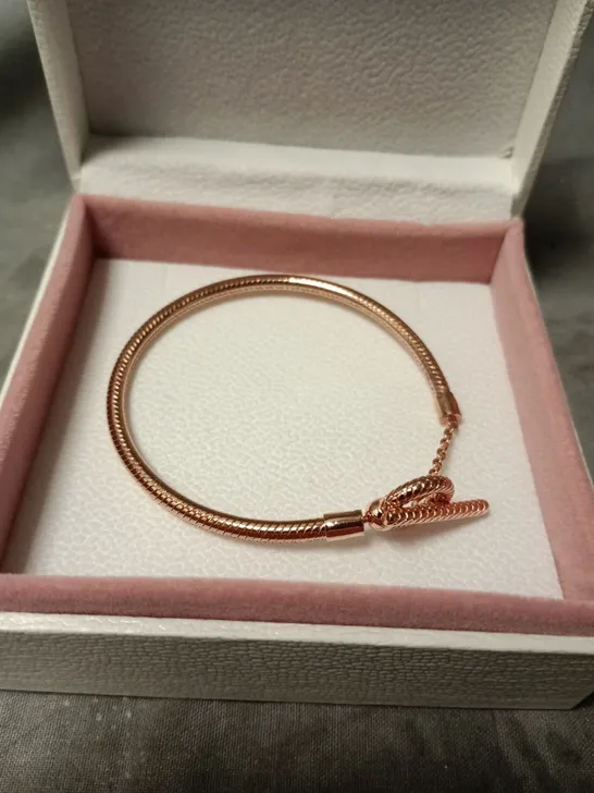 Lot 1060: PANDORA ROSE GOLD KNOT BRACELET IN BOX - 5413492 | Simon ...
