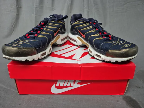 Lot 9026: BOXED PAIR OF NIKE AIR TN SHOES IN NAVY/GOLD/RED UK SIZE 9.5 ...
