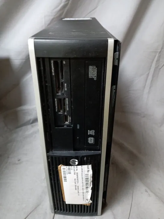 Lot 5499: HP DESKTOP TOWER PC WITH DVD DRIVE - DAMAGE TO SIDE PANEL ...