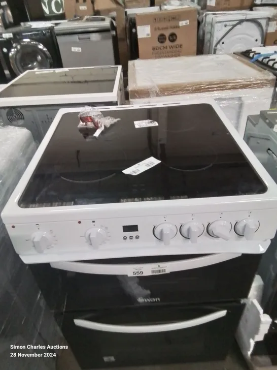 Lot 559: SWAN SX16720W 60CM WIDE TWIN CAVITY ELECTRIC COOKER WITH ...