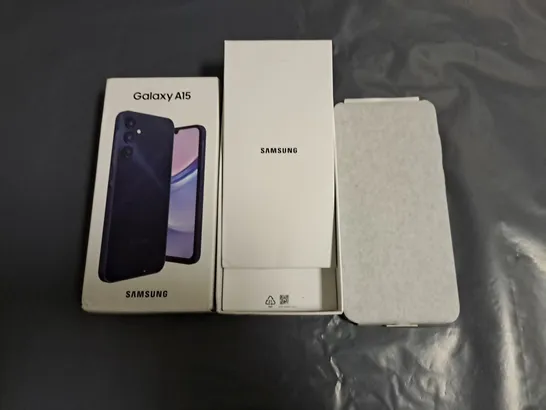 Lot 2402: BOXED SAMSUNG GALAXY A15 4GB 128GB PHONE IN BLUE BLACK - SM ...