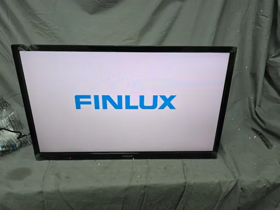 Lot 9649: FINLUX FLAT-SCREEN TELEVISION – POWER ON, LOGO DISPLAYED ...