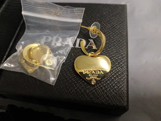 Lot 6238: BOXED PAIR OF PRADA HEART HOOP EARRINGS - 4961239 | Simon ...