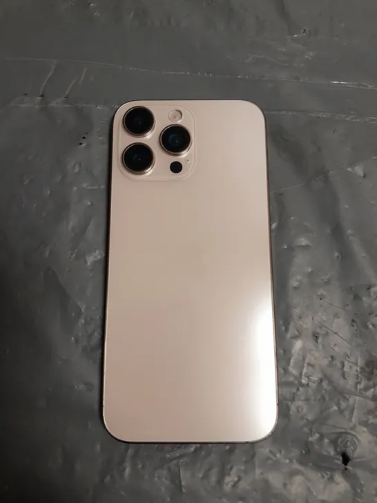 Lot 1904: APPLE IPHONE 16 PRO MAX IN DESERT TITANIUM - 5231593 | Simon Charles Auctioneers