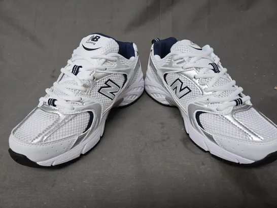 Lot 4247: BOXED PAIR OF NEW BALANCE 530 TRAINERS IN WHITE/SILVER/NAVY ...