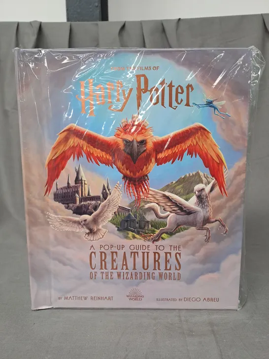 Lot 4021: HARRY POTTER A POP-UP GUIDE TO THE CREATURES OF THE WIZARDING ...