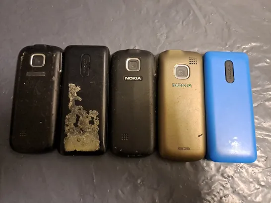 Lot 1048: 5 ASSORTED NKIA PHONES TO INCLUDE C1-01, RM-908, RM-512, ETC ...
