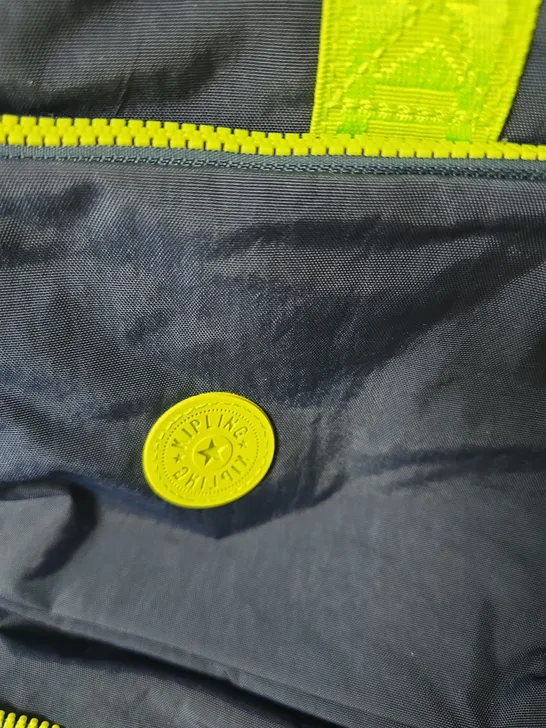 Lot 864: KIPLING NAVY BAG WITH NEON YELLOW ACCENTS AND MONKEY CHARM ...