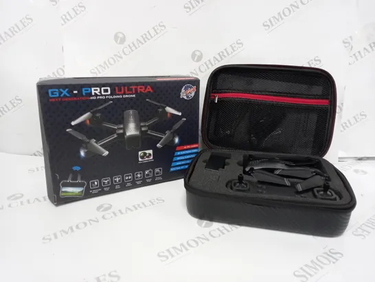 Lot 2143: BOXED RDM GX-PRO ULTRA NEXT GENERATION HD PRO FOLDING DRONE ...