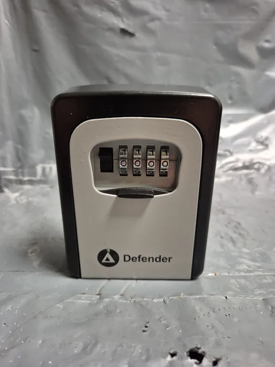 Lot 2764: BOXED DEFENDER COMBINATION KEY SAFE - 5235818 | Simon Charles ...