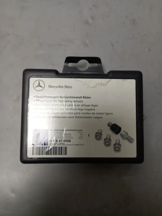 Lot 2031: MERCEDES BENZ WHEEL LOCKS NUTS - 4750663 | Simon Charles ...