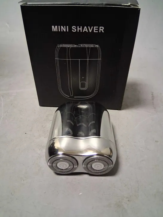 Lot 5345: APPROXIMATELY 14 BOXED MINI SHAVERS - 5052645 | Simon Charles ...